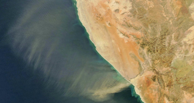 Dust blowing off the coast of Namibia • Earth.com