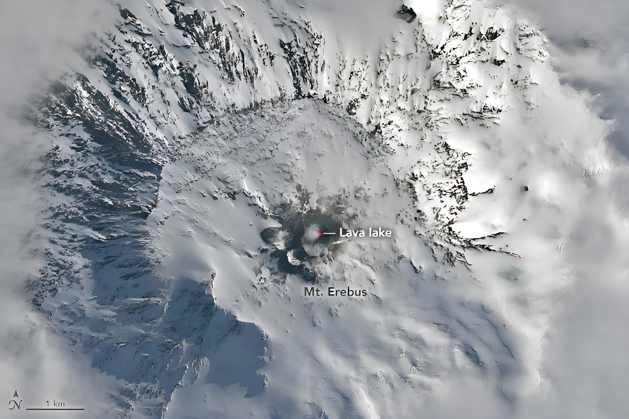 Mount Erebus breaks through the clouds - Earth.com