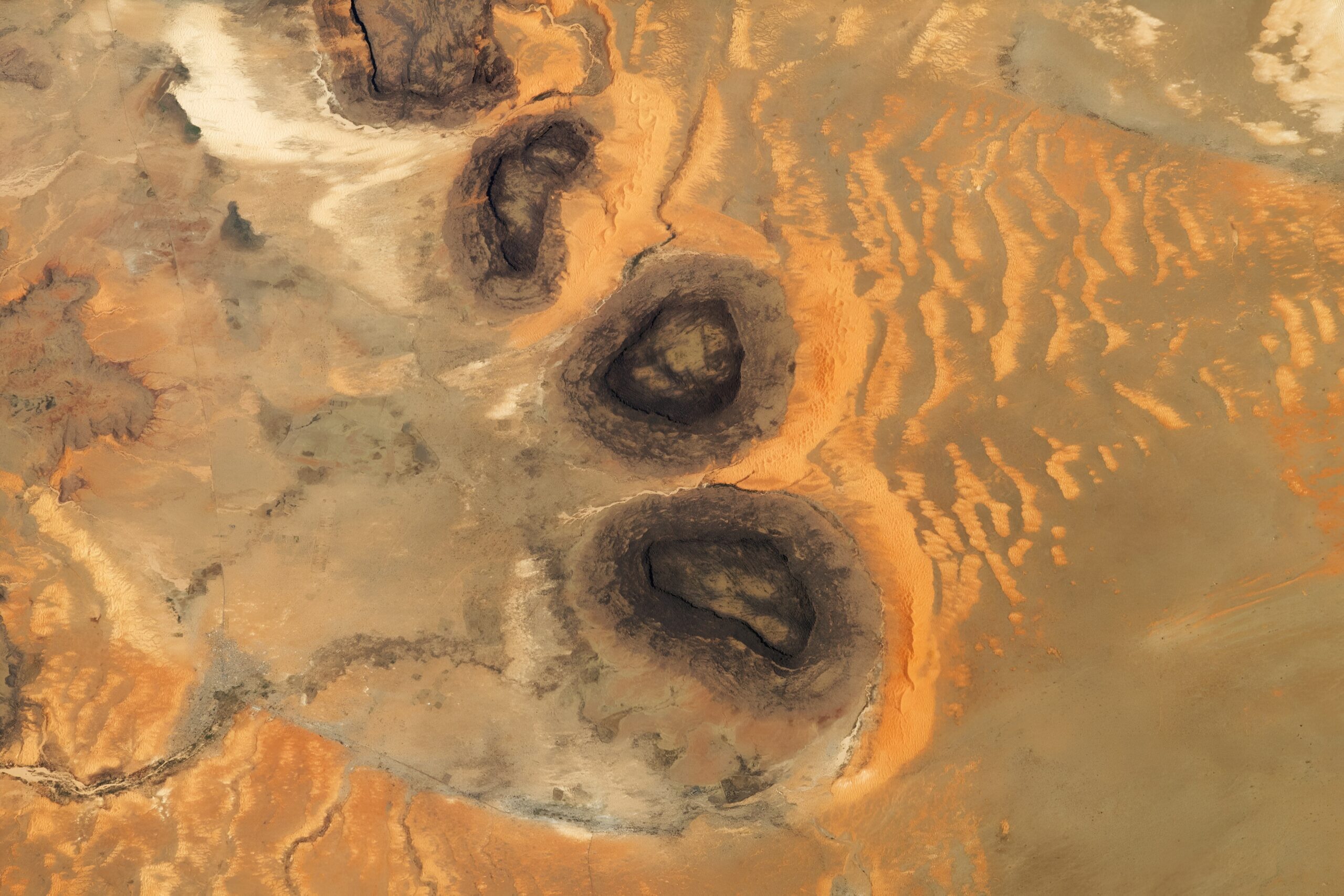 Hills and sand dunes of southern Mauritania • Earth.com