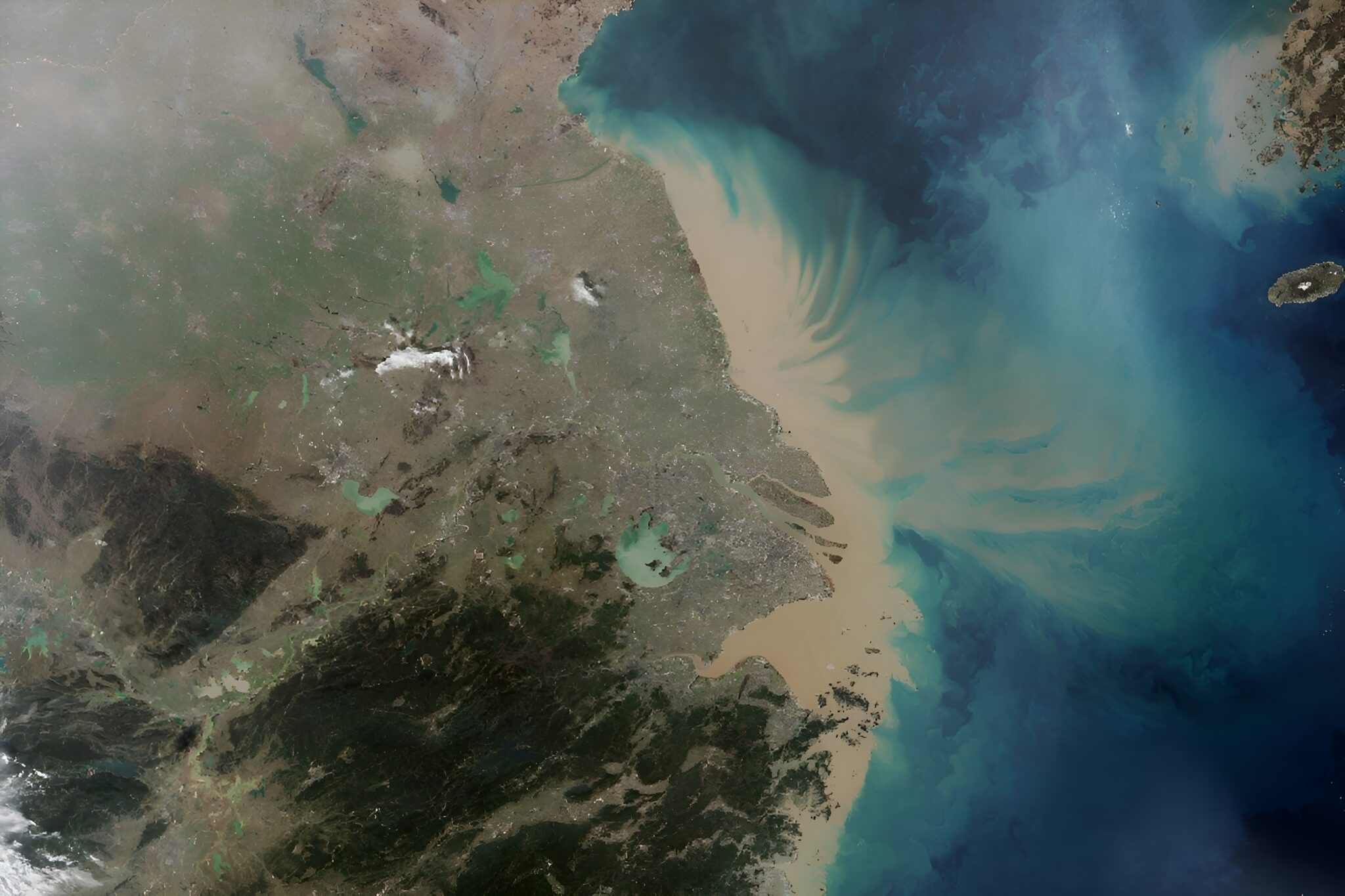 Sediment flows offshore from the Yangtze River - Earth.com