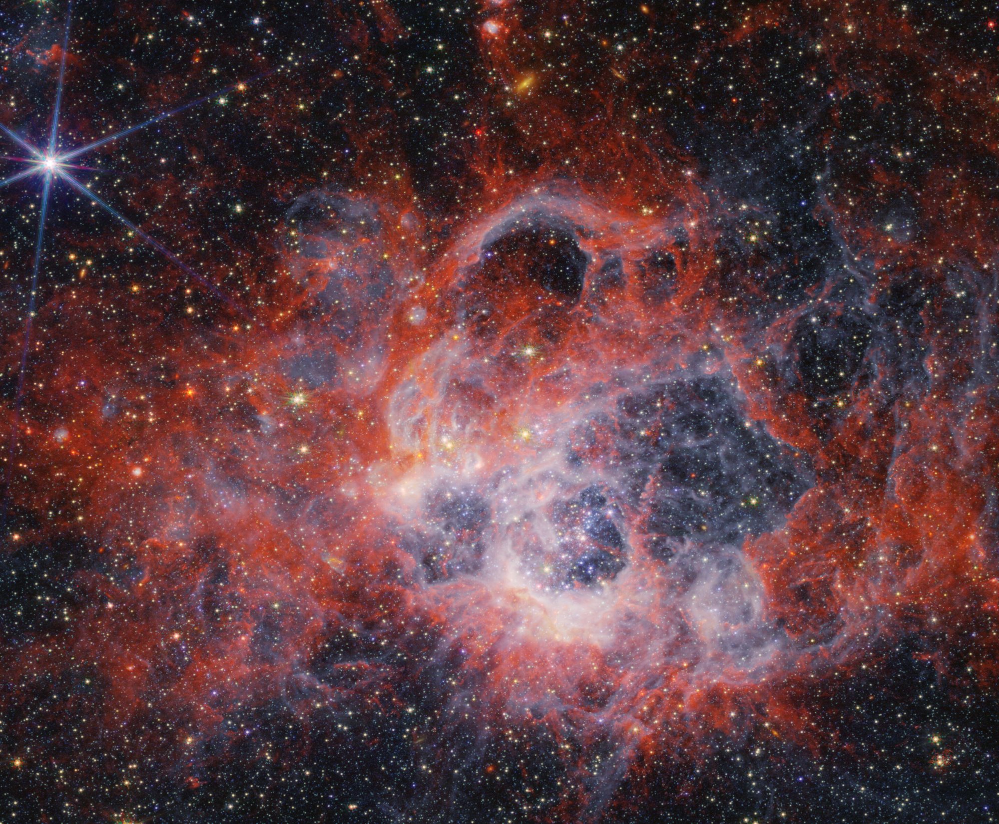 NGC 604 is home to hundreds of hot, massive stars • Earth.com