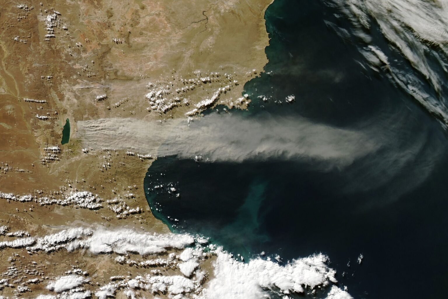 Dust streams from Lago Colhué Huapi in Argentina - Earth.com