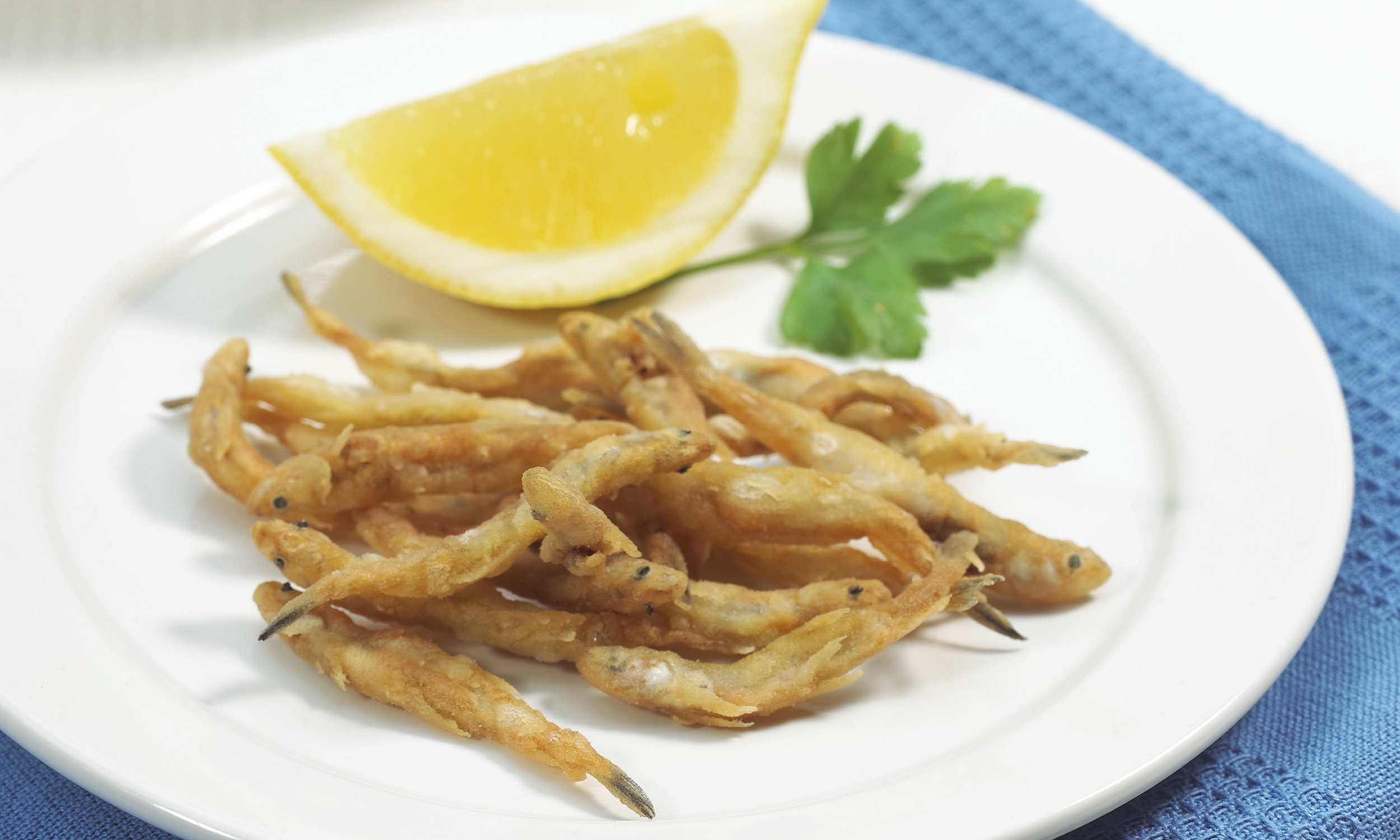 Eating small fish whole reduces cancer risk in women - Earth.com