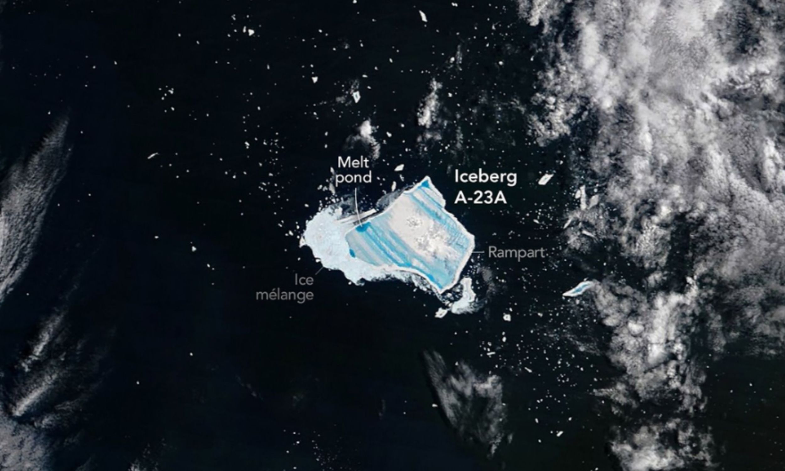 Blue meltwater marks the final days for massive iceberg A-23A - Earth.com